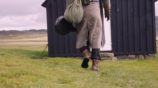Man Approaching A House
