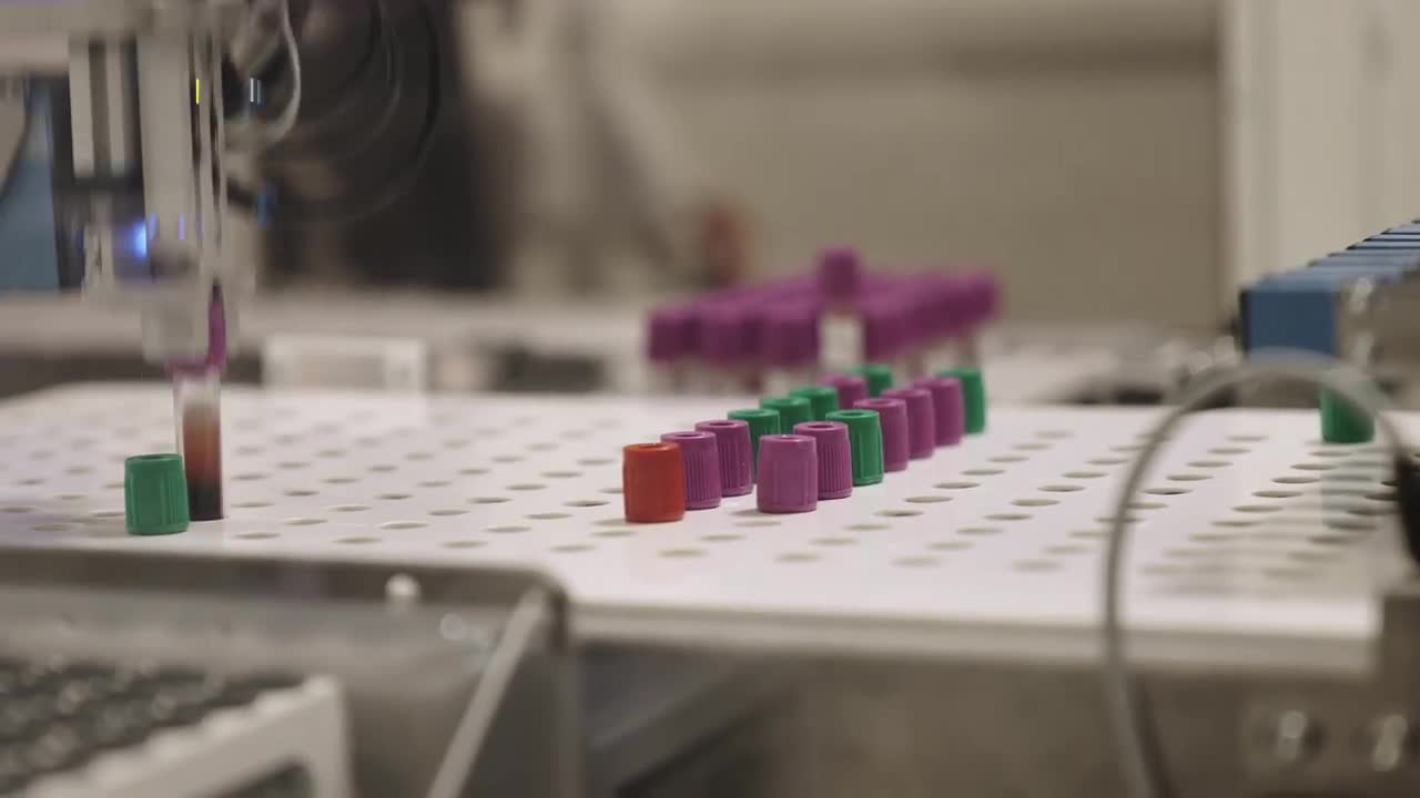 Robotic Arm Moving Test Tubes - Stock Video | Motion Array