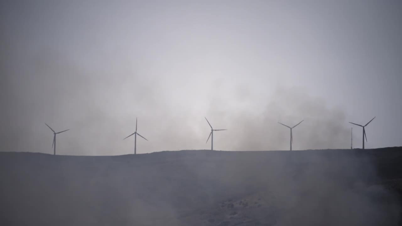 Smoke Above Wind Turbines - Stock Video | Motion Array