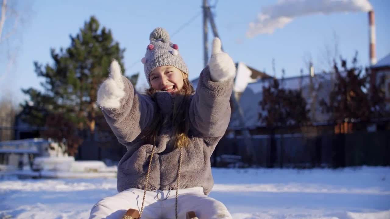 Girl Show Thumbs Up Winter - Stock Video | Motion Array