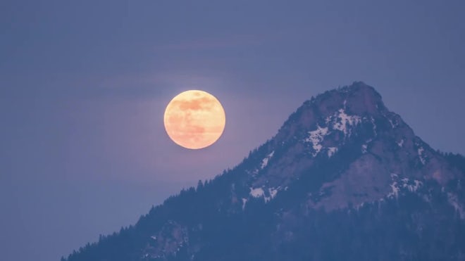 Full Moon Rising Over Mountains