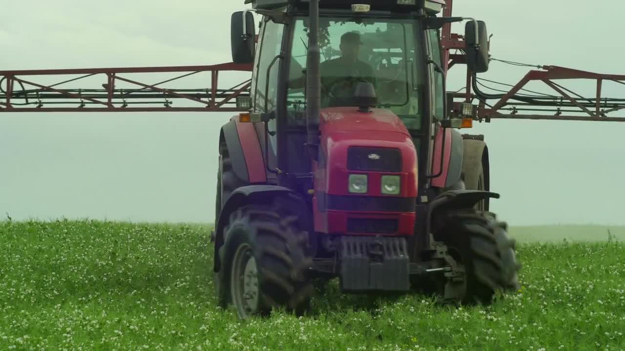 Irrigation With Tractor On A Forage... - Stock Video | Motion Array