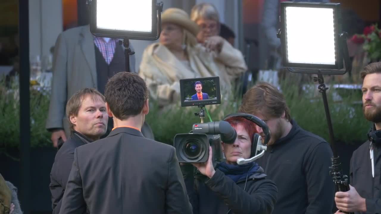 A Camera Crew Filming On A Street - Stock Video | Motion Array