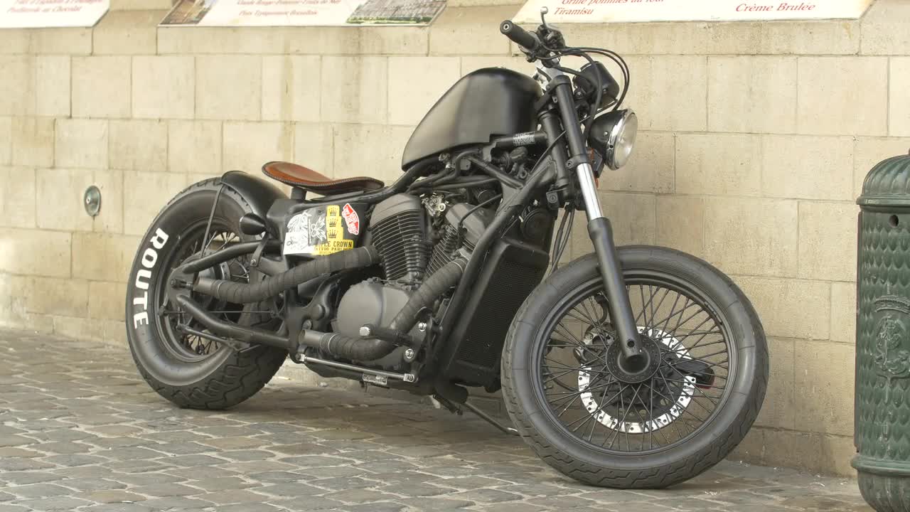 Motorcycle Leaning Against A Wall - Stock Video | Motion Array