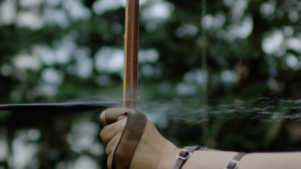 Shooting With Bow And Arrow, Ultra... - Stock Video | Motion Array