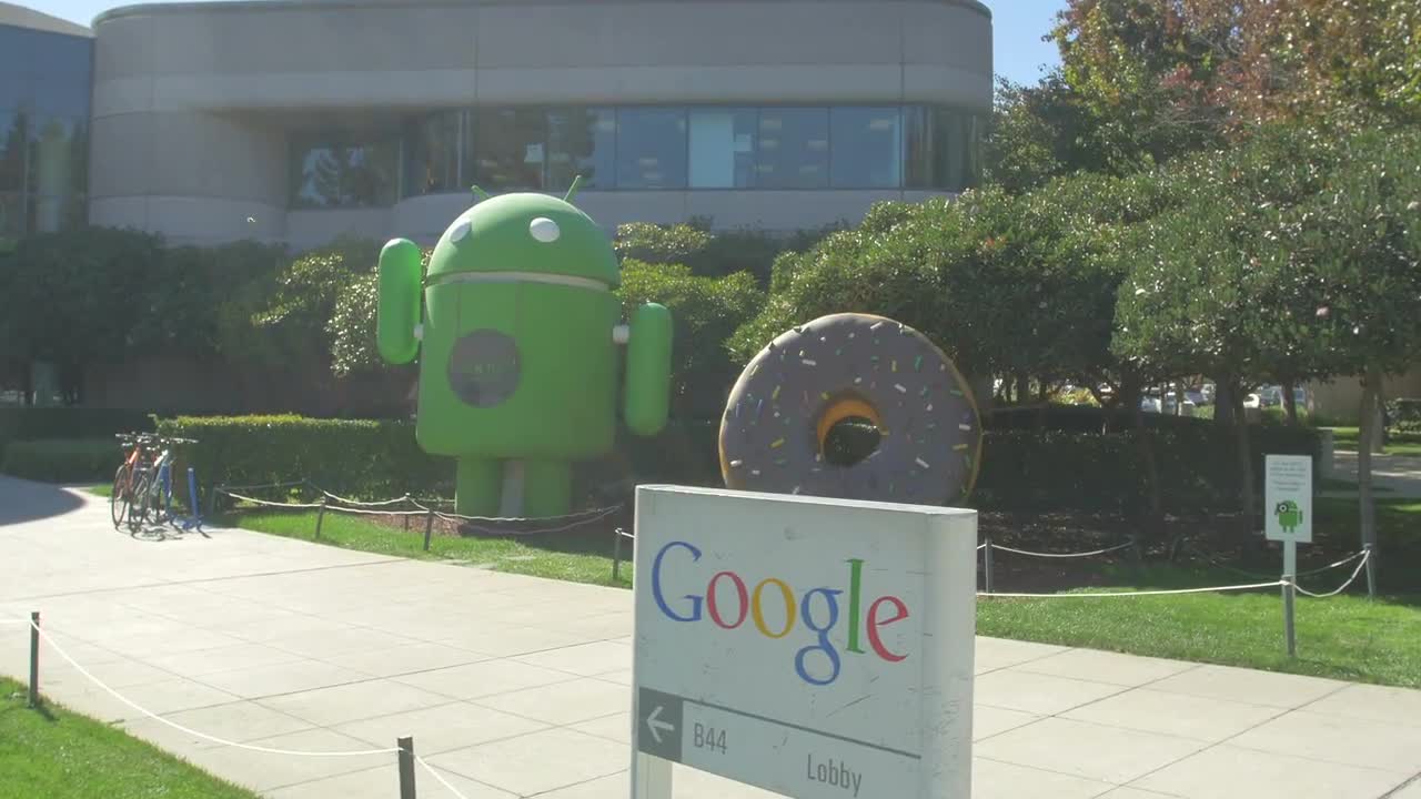 Mascots In Android Park - Stock Video | Motion Array