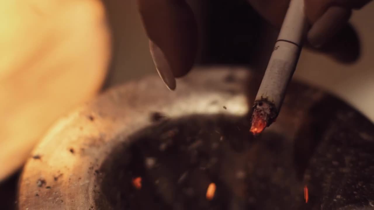 Woman Drops Ash Of A Cigarette Into... - Stock Video | Motion Array