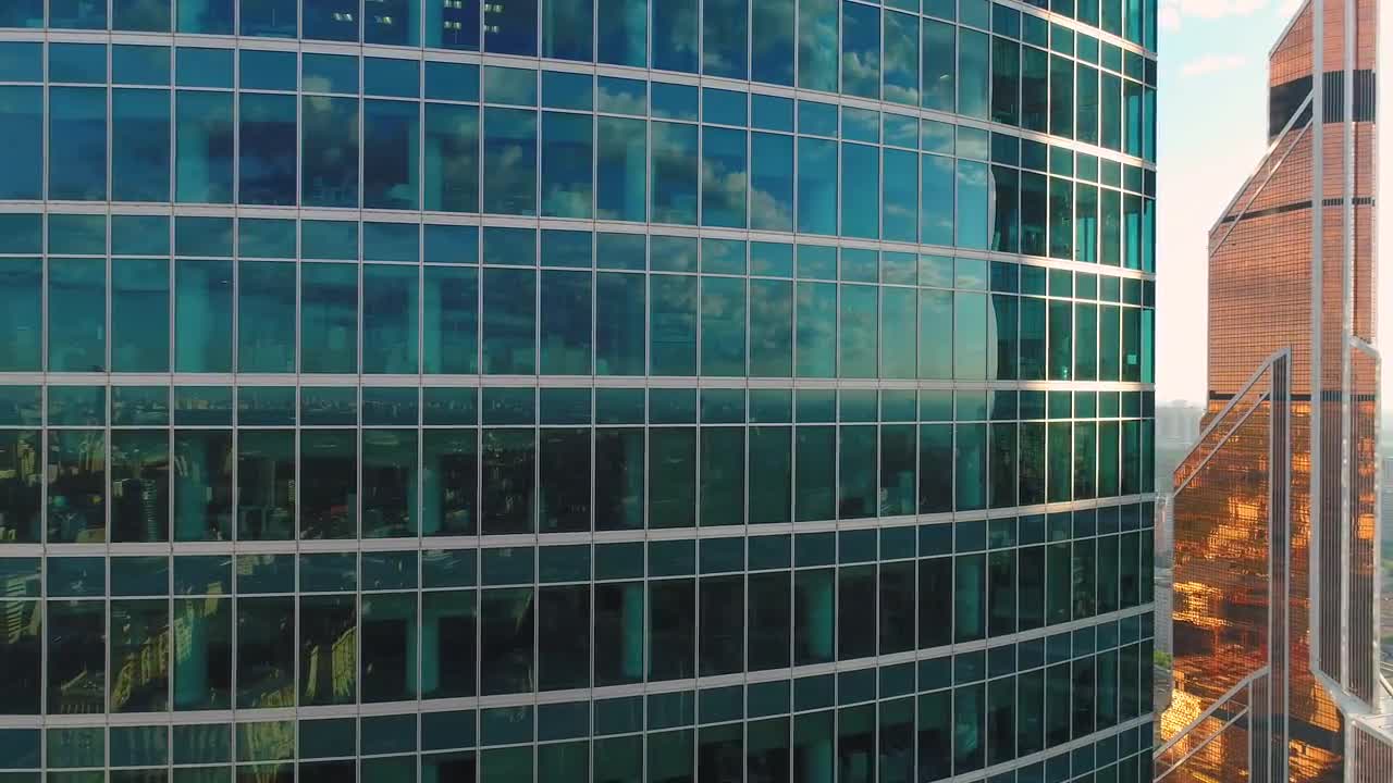 Aerial Of Glass Skyscraper - Stock Video | Motion Array