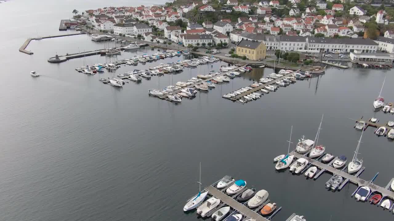 Boats In A Harbor, Risor, Norway, Aerial - Stock Video | Motion Array