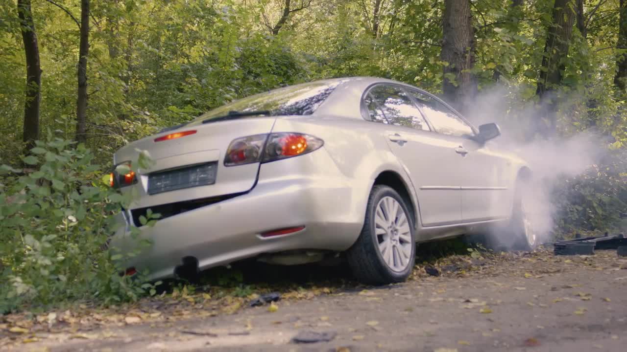 Broken Car Emitting Smoke After Crash - Stock Video | Motion Array