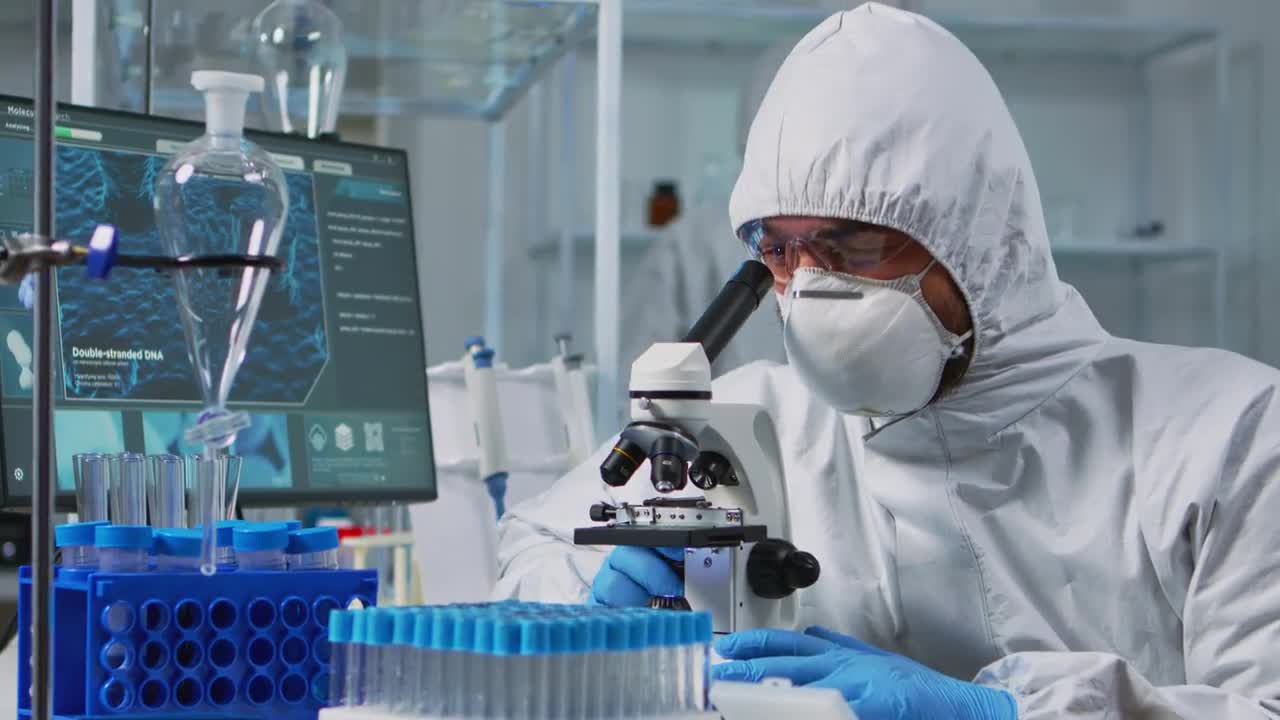 Scientist Analyzing A Sample - Stock Video | Motion Array