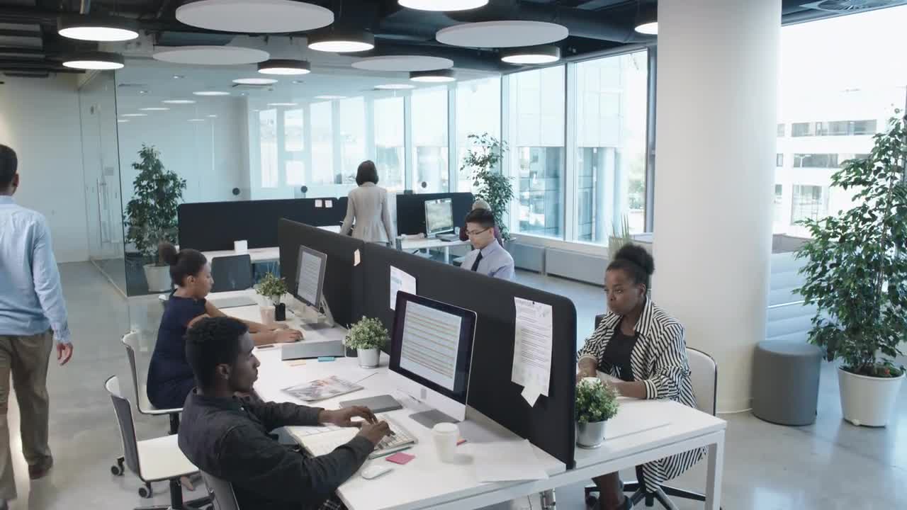 Employees In Open Office Workspace - Stock Video | Motion Array