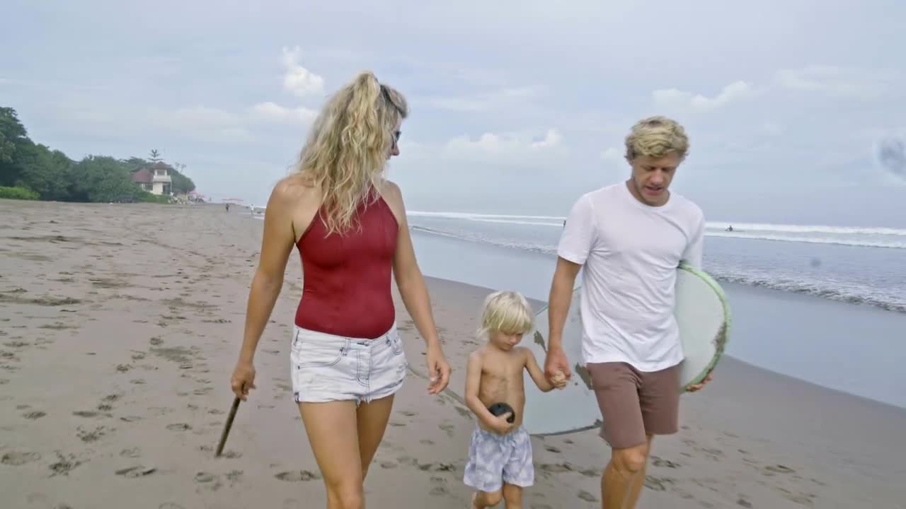 Surfing Family On Beach - Stock Video | Motion Array