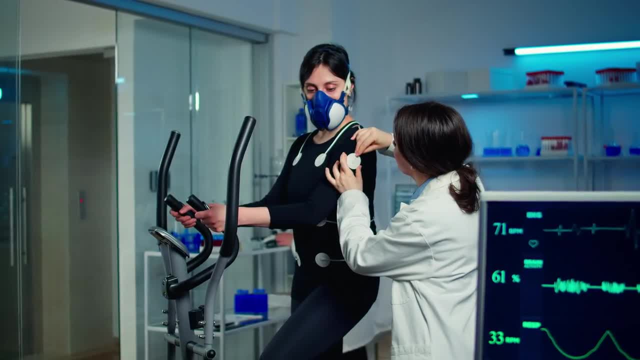 Athlete With Mask Testing VO2 Max - Stock Video | Motion Array
