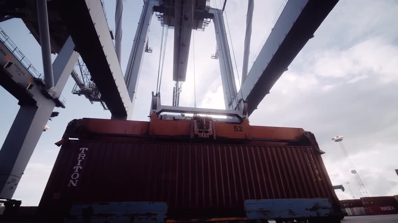 Container To Be Picked Up By Tower Crane - Stock Video | Motion Array