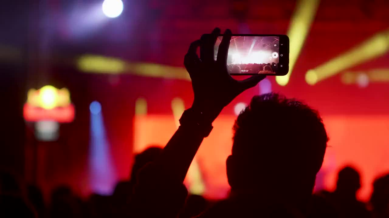 Filming A Concert - Stock Video | Motion Array