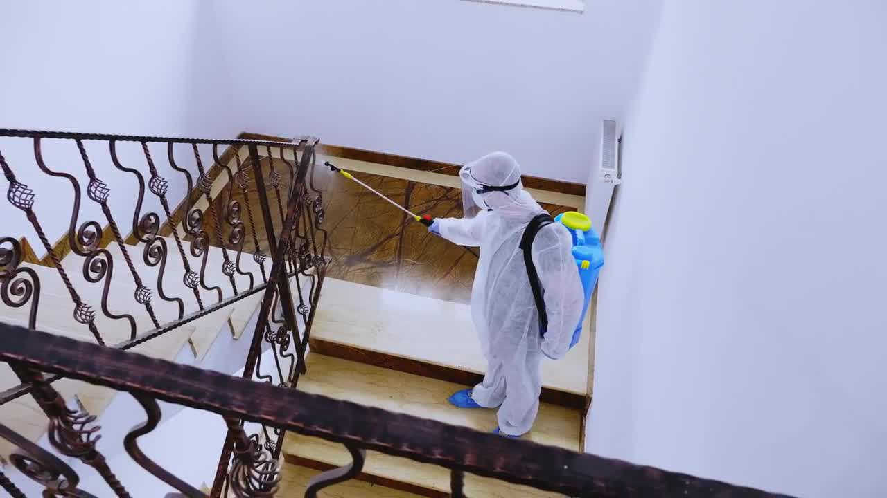 Spraying Stairs In Apartment Building - Stock Video | Motion Array