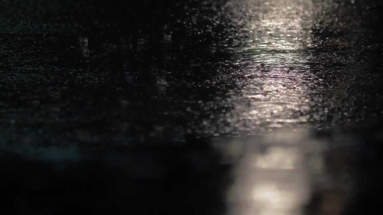 Raindrops On The Road - Stock Video | Motion Array