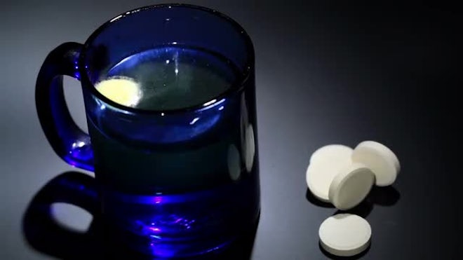 White Tablet Dissolving In Water - Stock Video | Motion Array