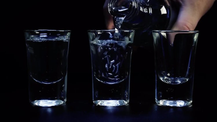 Pouring Three shots Of Vodka - Stock Video | Motion Array
