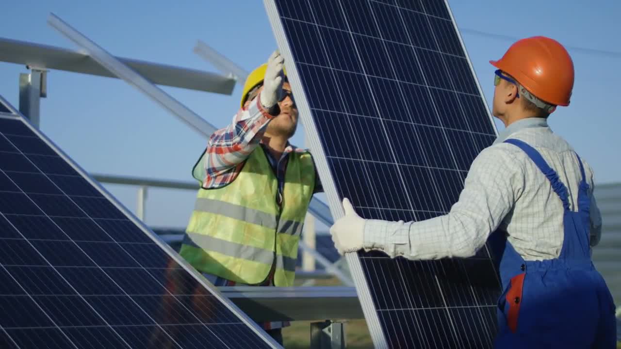 Carefully Placing A Solar Panel - Stock Video | Motion Array