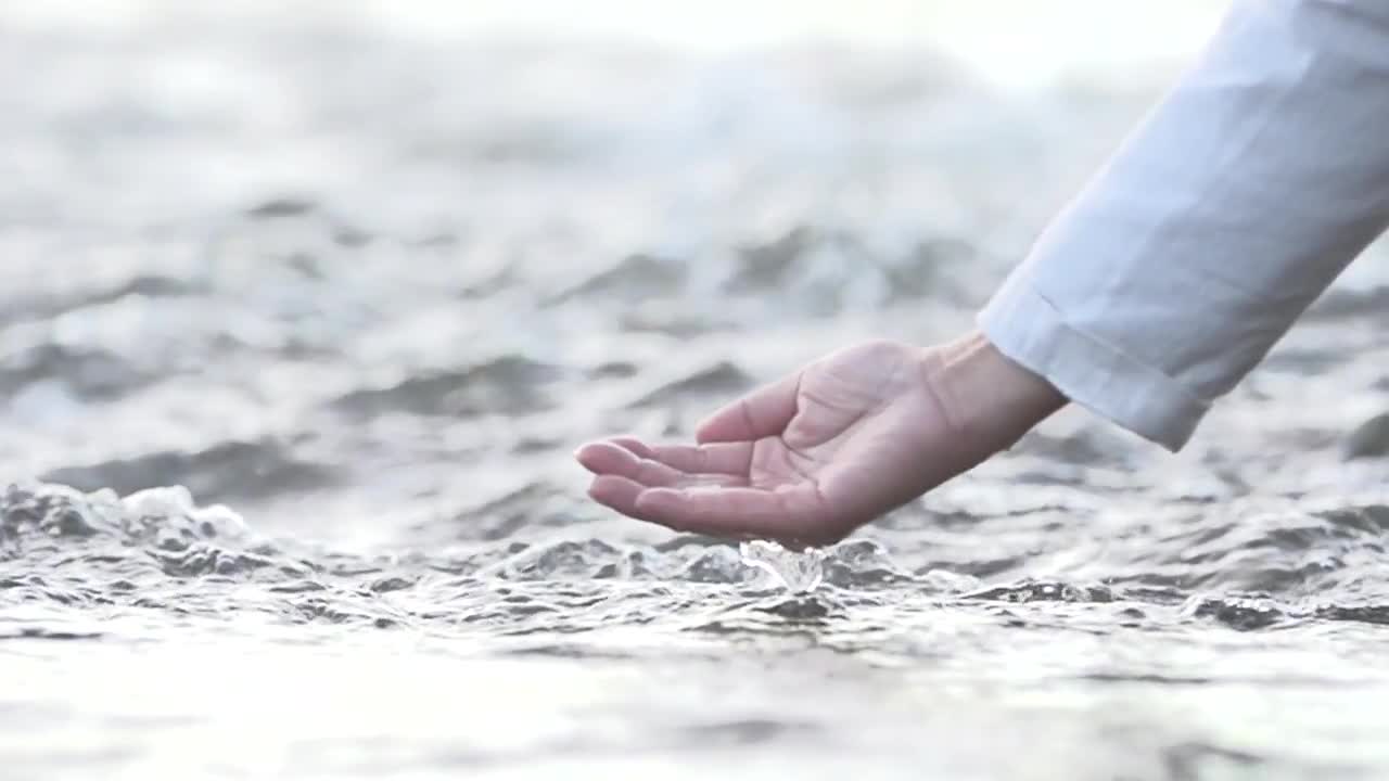 Hand Scooping Water From Ocean - Stock Video | Motion Array