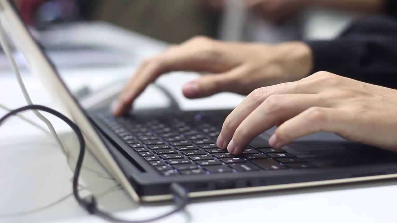 Typing During Hectic Work Day - Stock Video | Motion Array