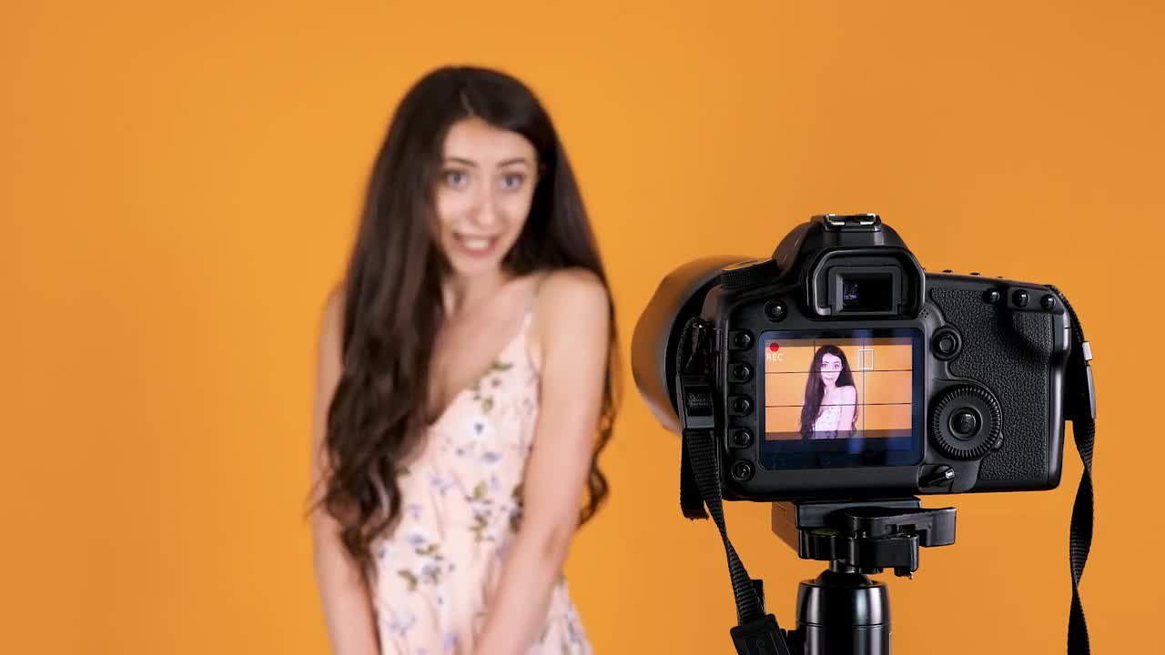 Beautiful Girl Vlogging On Camera - Stock Video | Motion Array