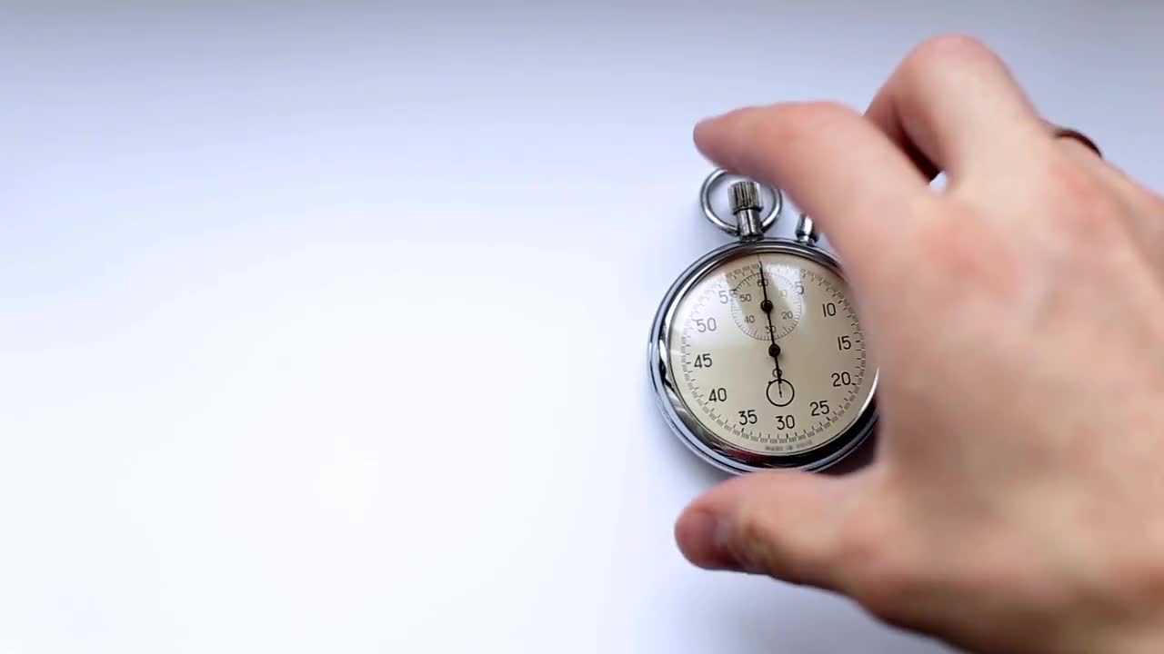 Man Setting A Stopwatch - Stock Video | Motion Array