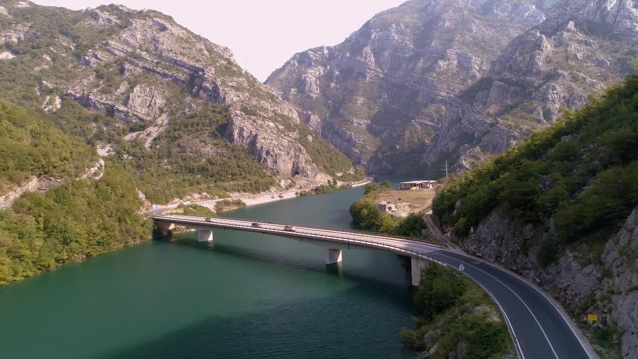 Cars Traverse Bridge Over Water - Stock Video | Motion Array