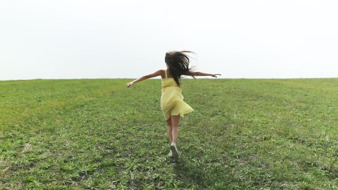 Girl Running In Meadow - Stock Video | Motion Array