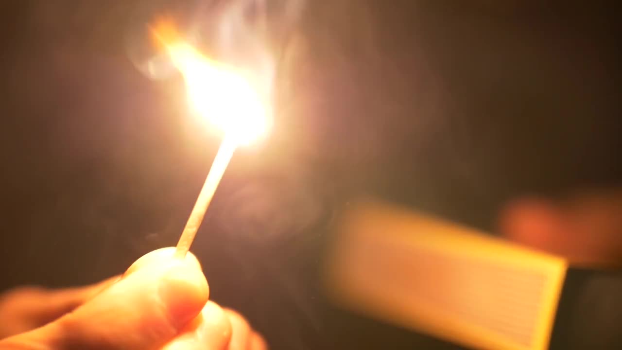 Striking Match In The Dark - Stock Video | Motion Array