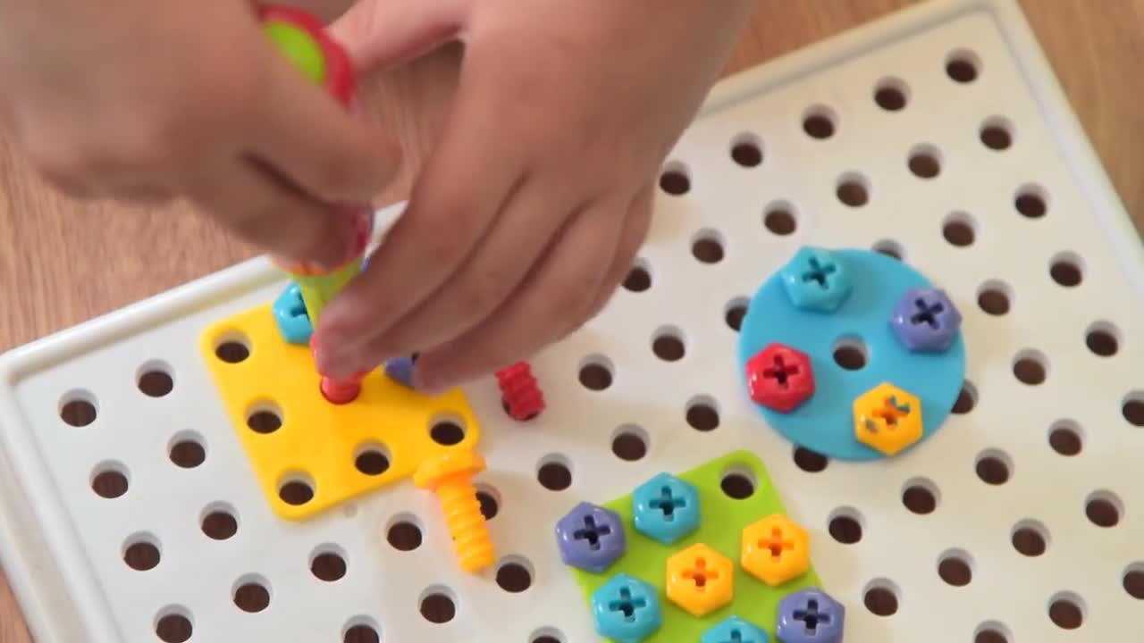 Child Playing With Screw Toys - Stock Video | Motion Array