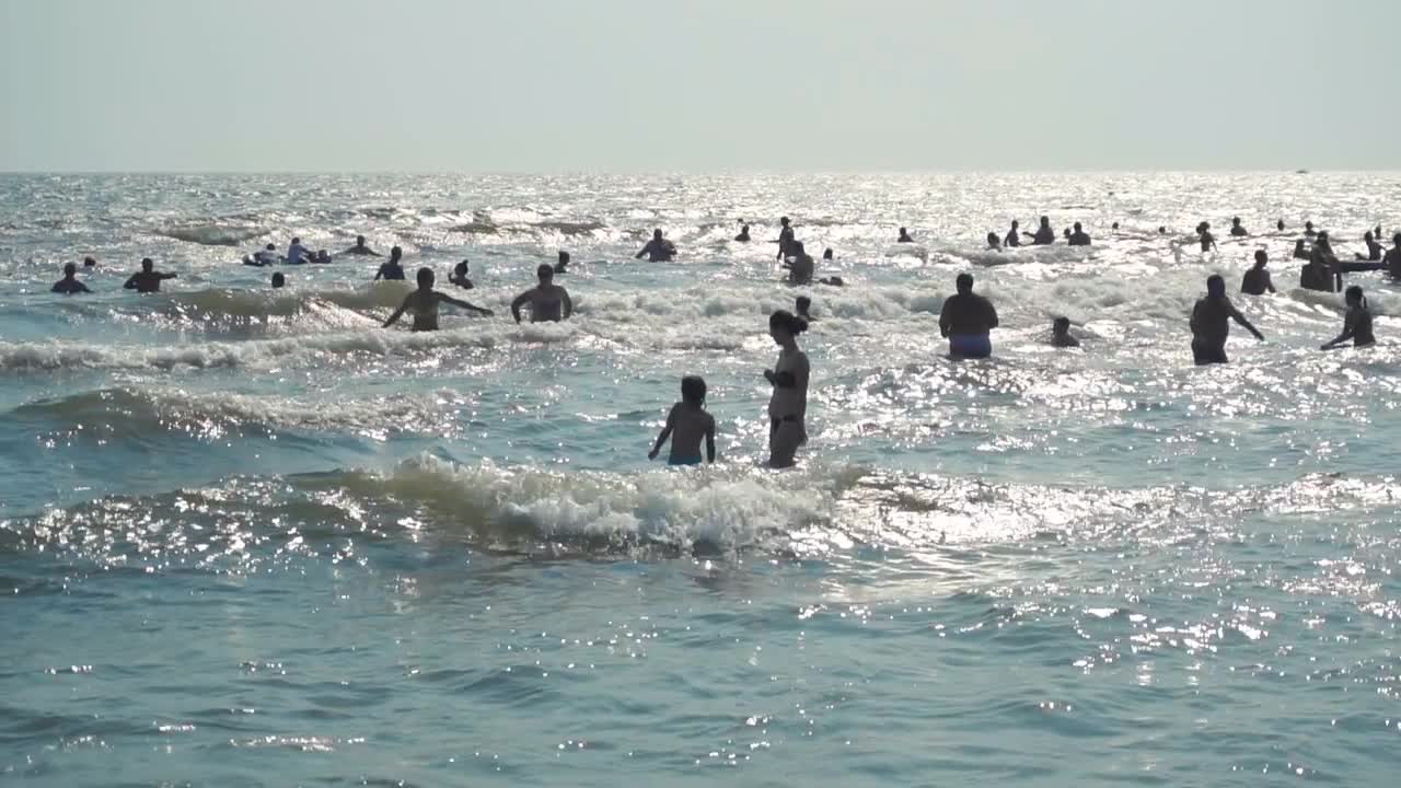 Sea Coastline With People - Stock Video | Motion Array
