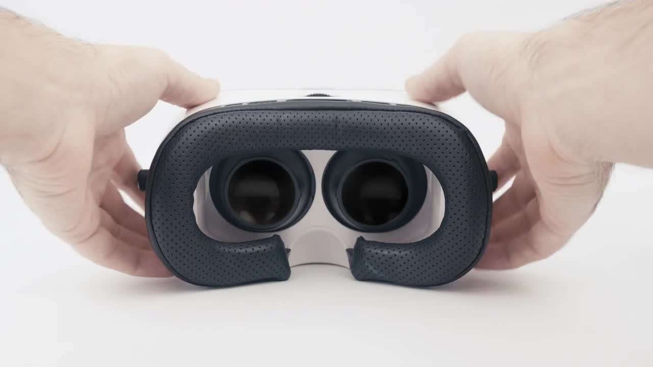 Putting On A VR Headgear - Stock Video | Motion Array