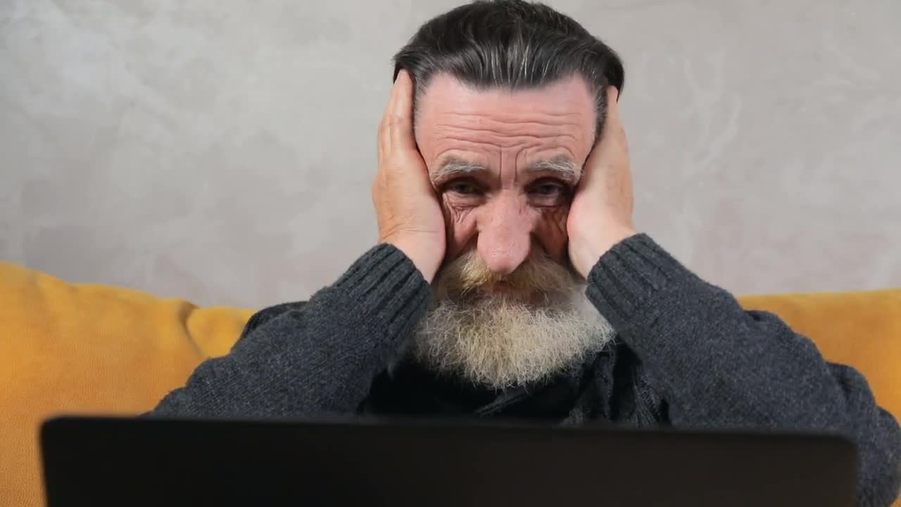 Elderly Man Frustrated With Laptop - Stock Video | Motion Array