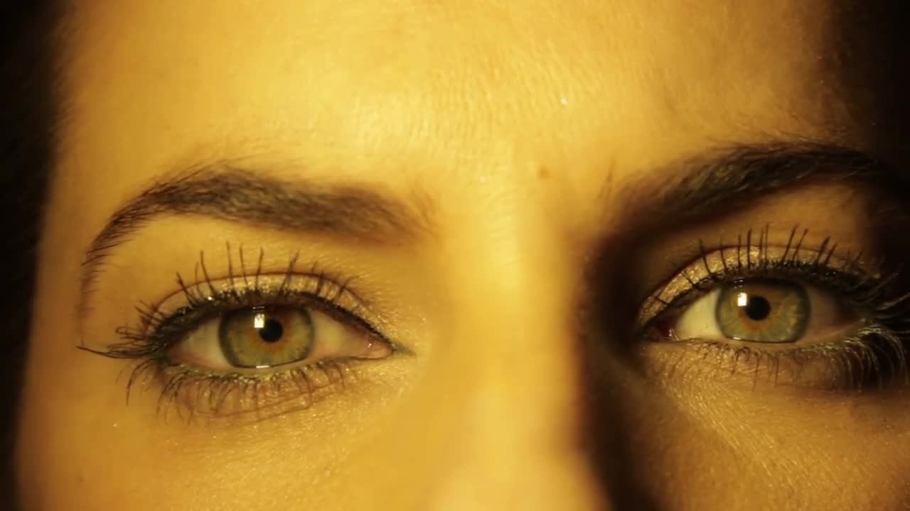 Woman Opens And Closes Eyes - Stock Video | Motion Array