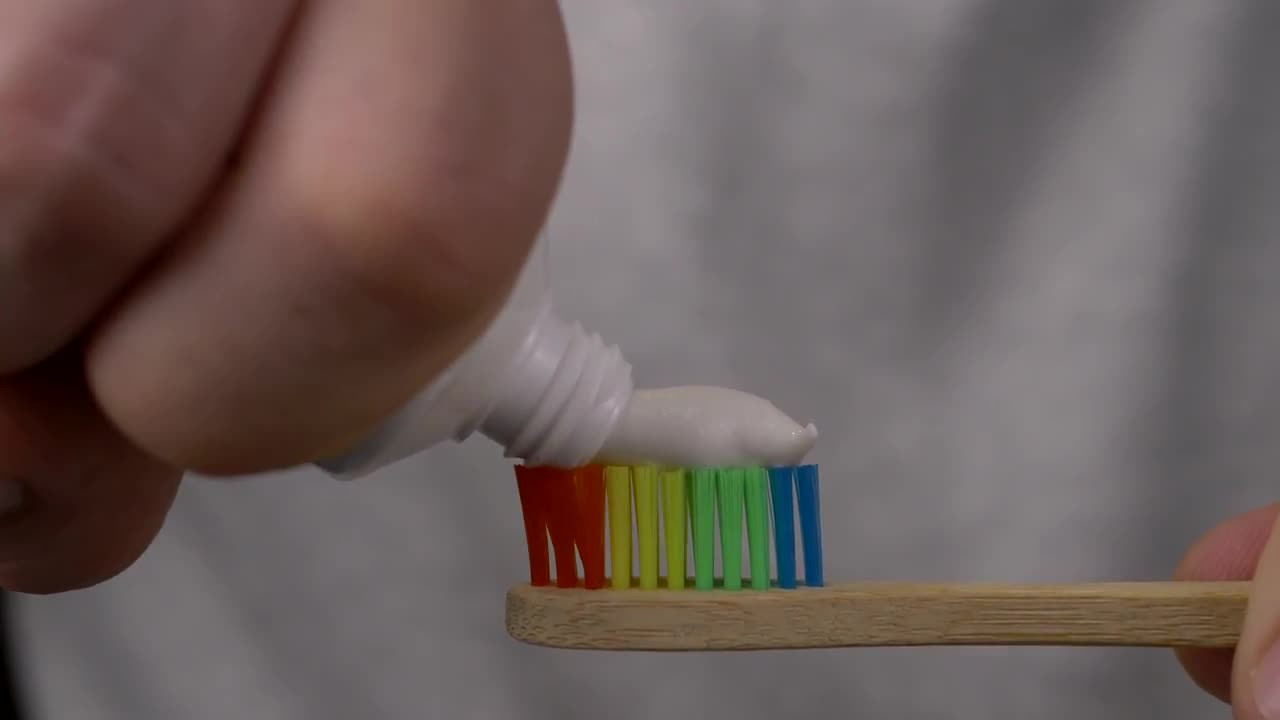 Applying Toothpaste On Toothbrush - Stock Video | Motion Array