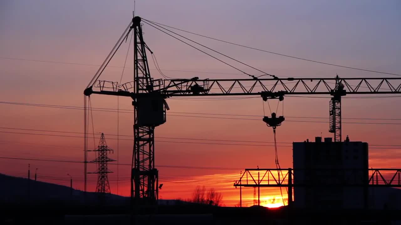 Construction Crane During Sunset - Stock Video | Motion Array