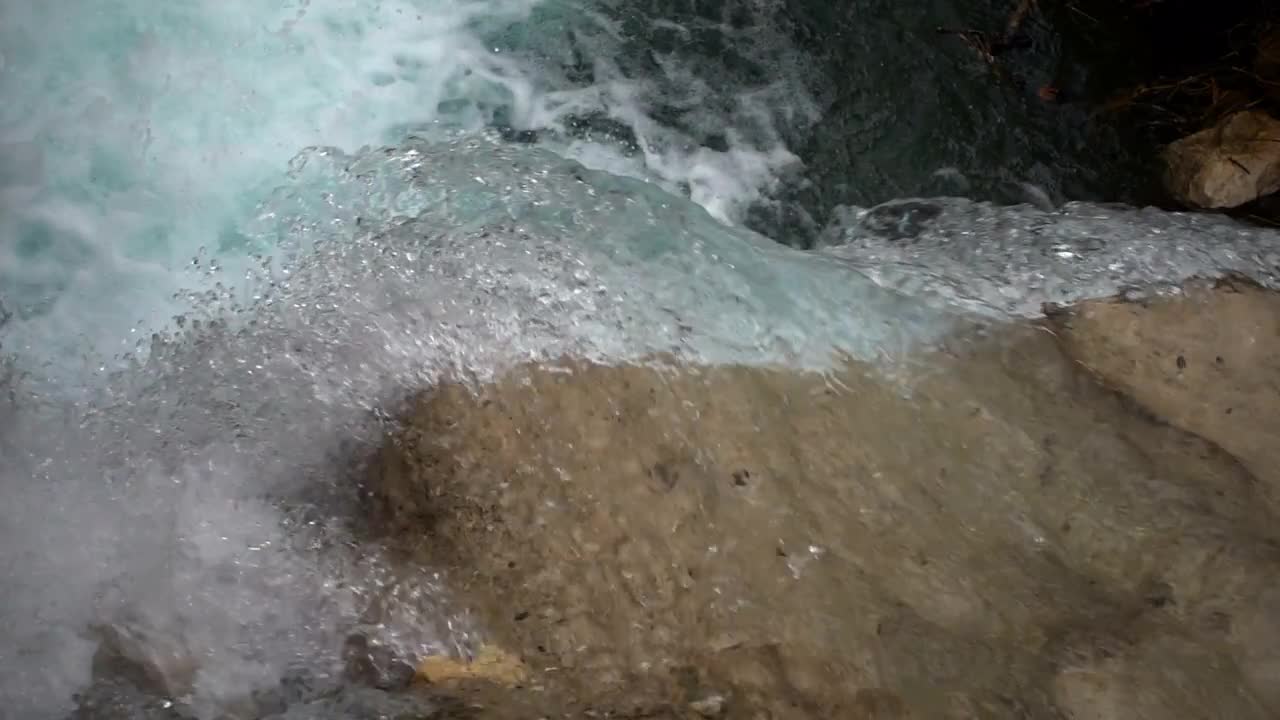Water Spilling Over Rock - Stock Video | Motion Array