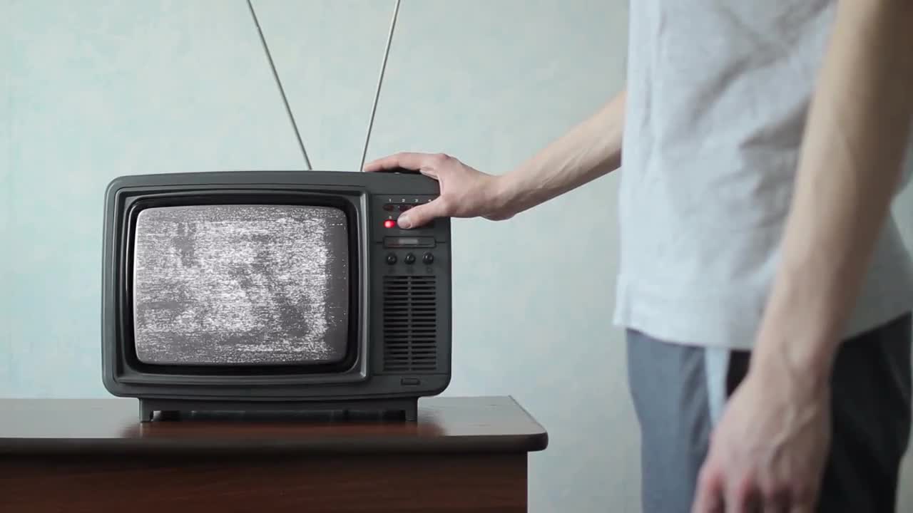 Man Switches Channels - Stock Video | Motion Array