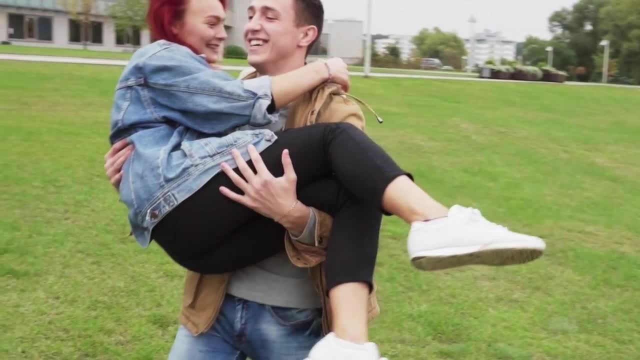 Man Carrying Girlfriend - Stock Video | Motion Array