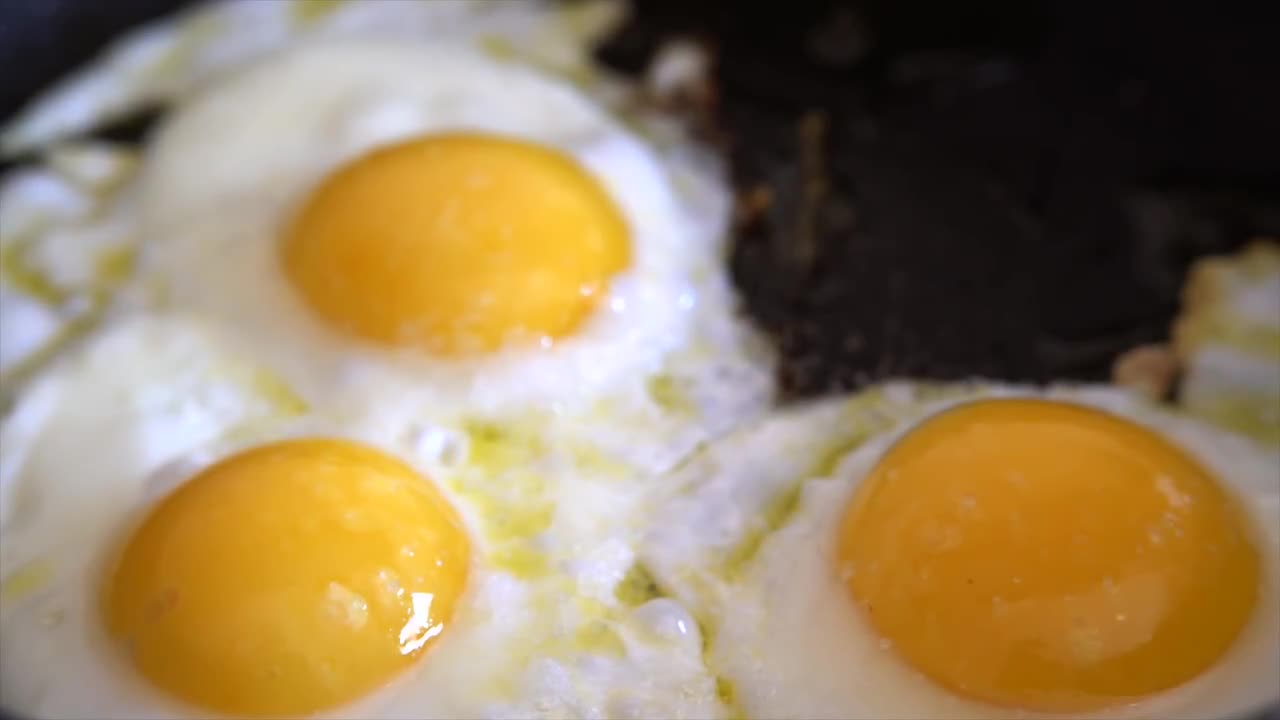 Frying Eggs - Stock Video | Motion Array