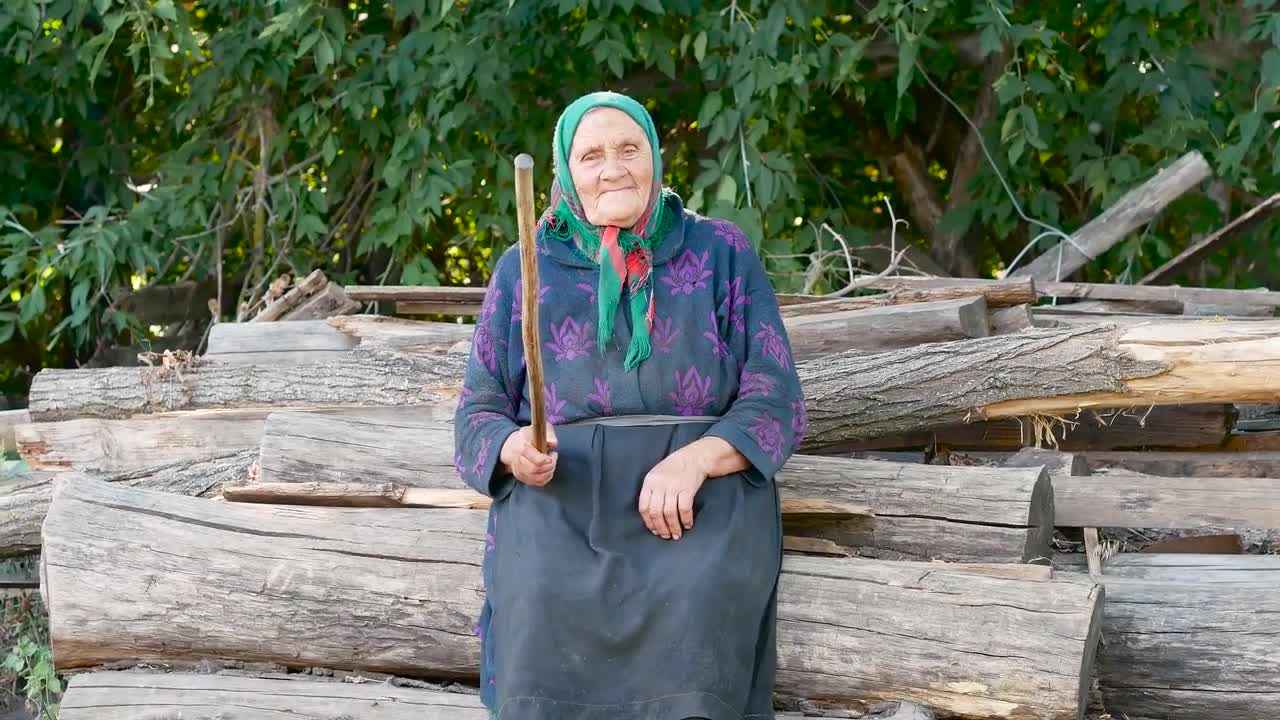 Grandmother Holding A Stick - Stock Video | Motion Array
