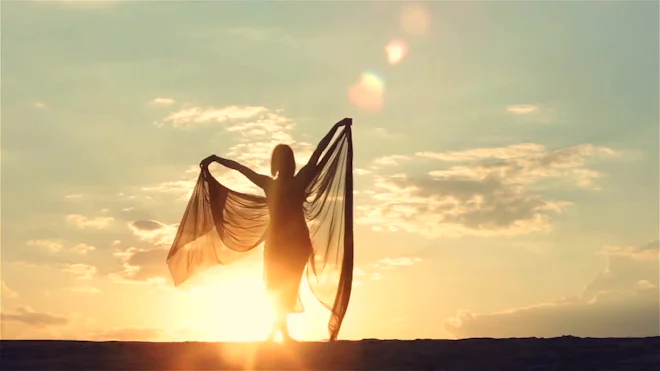 A Girl Dancing In The Sunset