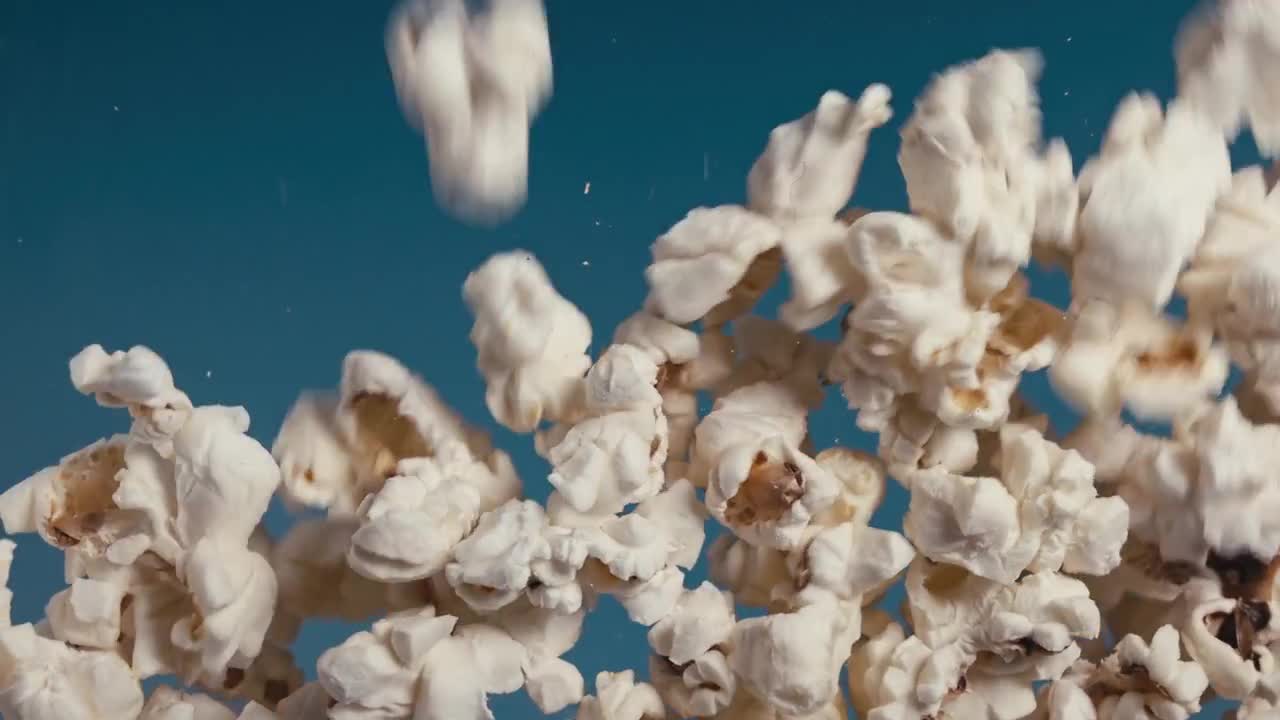 Popcorn Falling - Stock Video | Motion Array