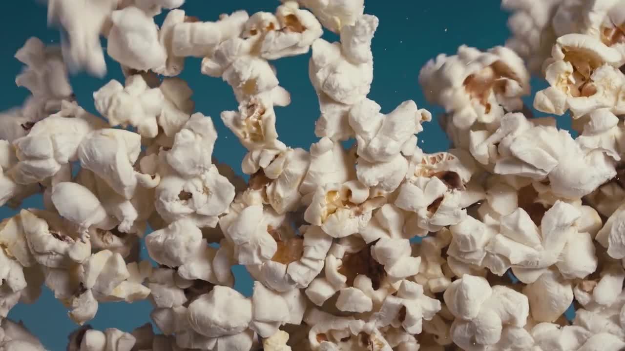 Popcorn Falling - Stock Video | Motion Array