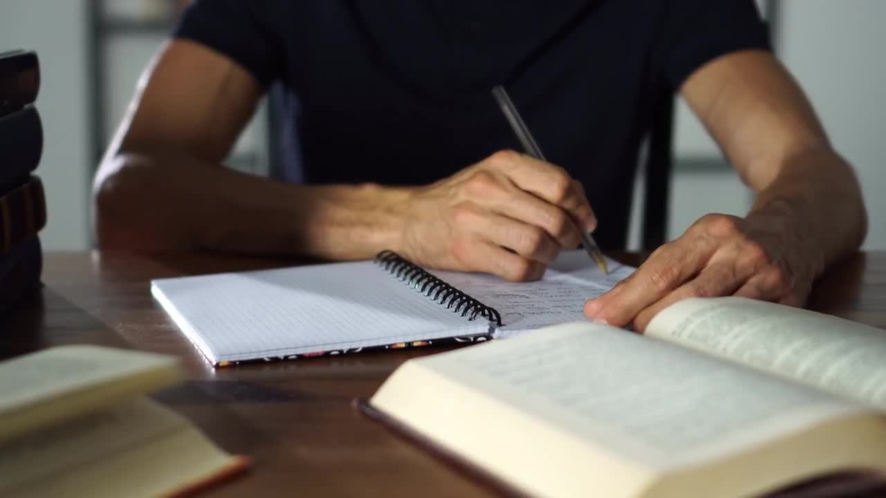 A Student Writes - Stock Video | Motion Array