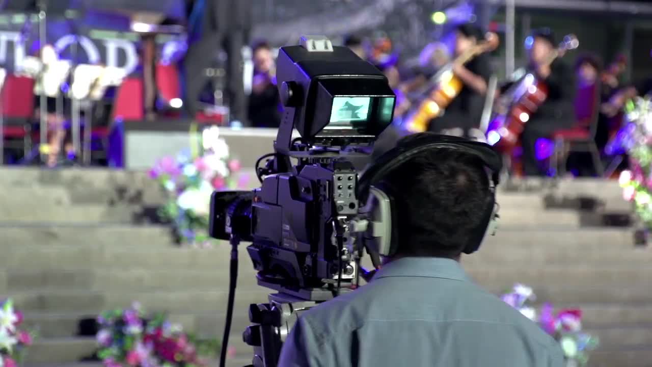 Filming An Event - Stock Video | Motion Array