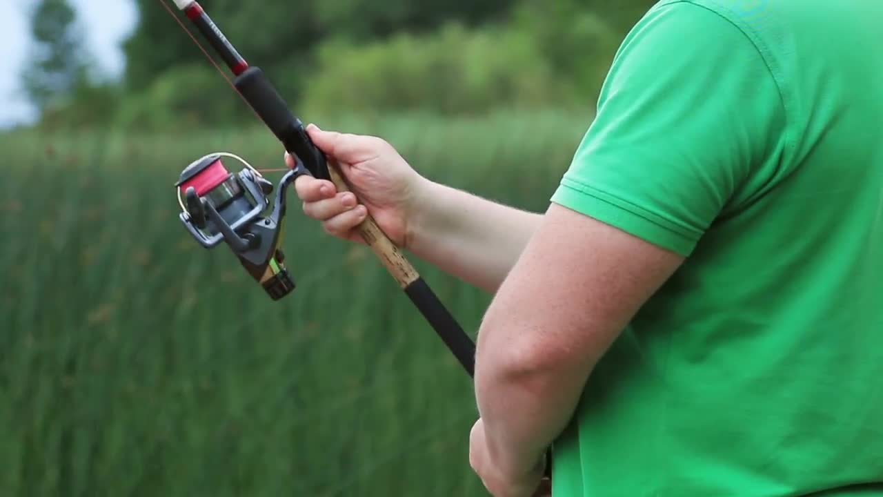 Man Fishing With A Rod - Stock Video | Motion Array